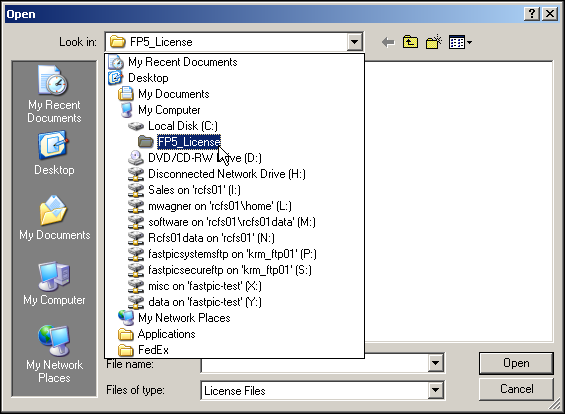 How do you load the license file in the Kardex Power Pick System?